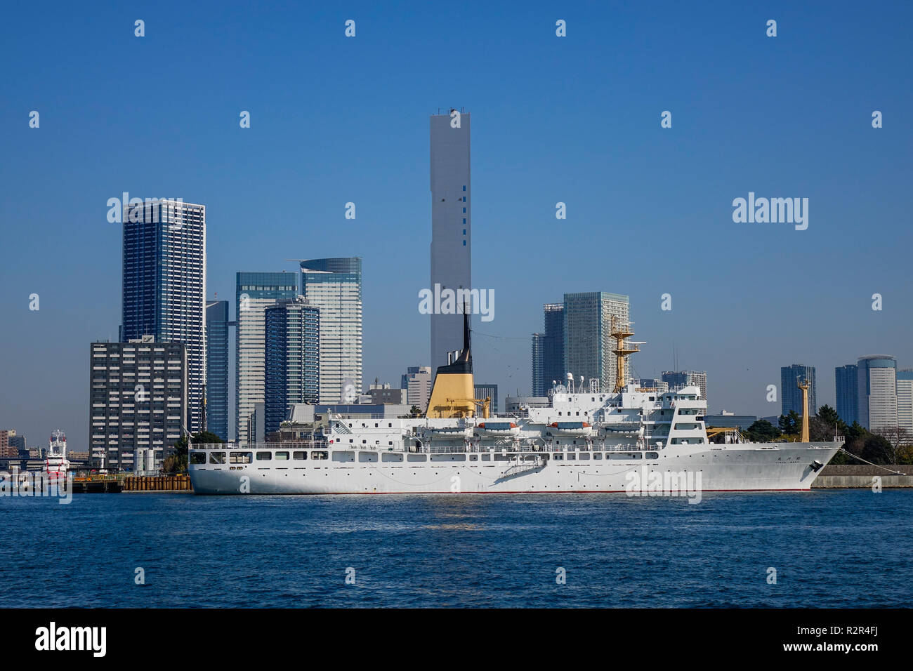Tokyo, Japan - Jan 4, 2016. A cruise ship docking at tourist jetty on ...