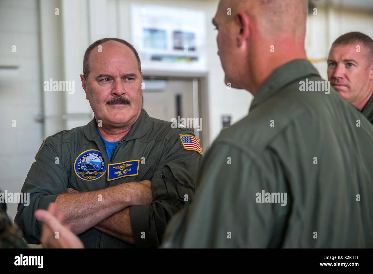 U.S. Navy Rear Adm. Greg Harris, left, chief, Naval Air Training ...