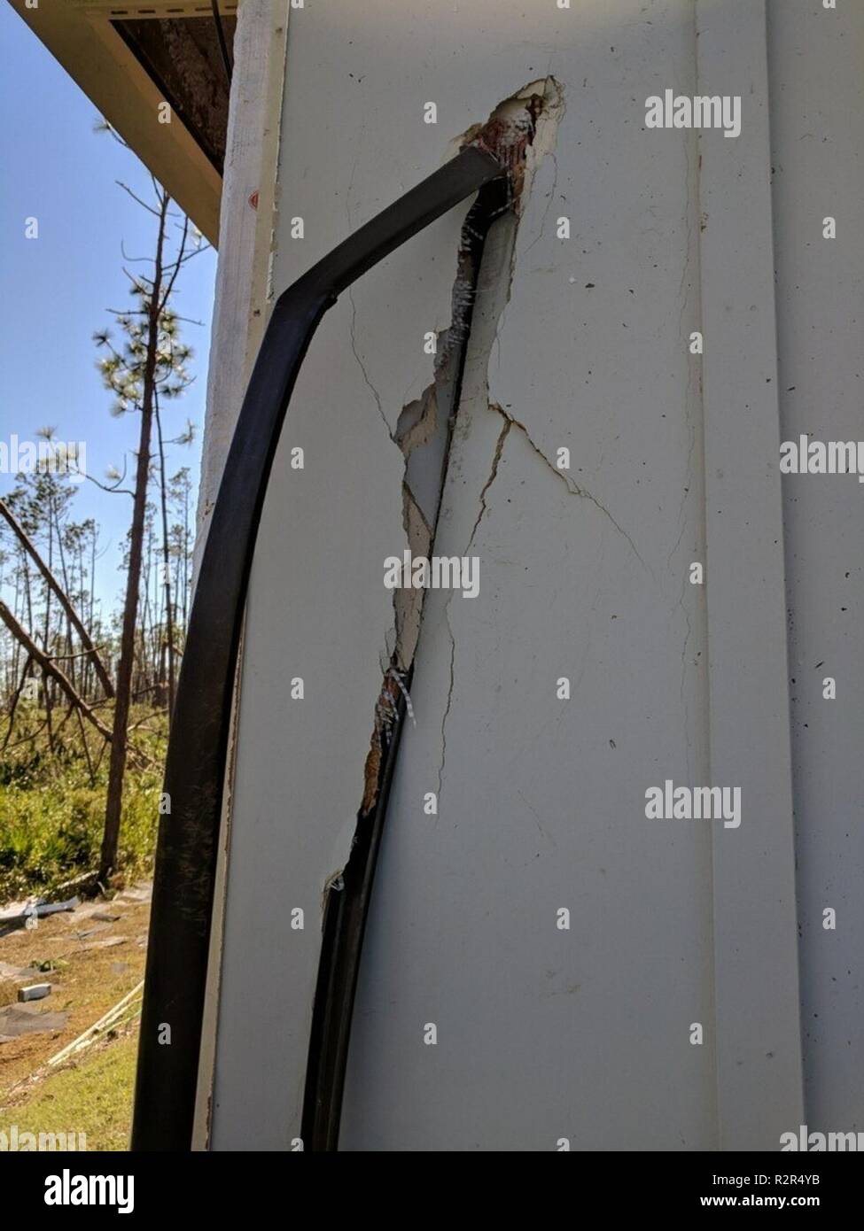 The strong winds from Hurricane Michael tossed a patio table into the ...