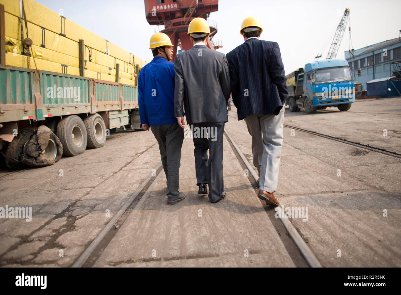 Group men posing photo along hi-res stock photography and images - Alamy