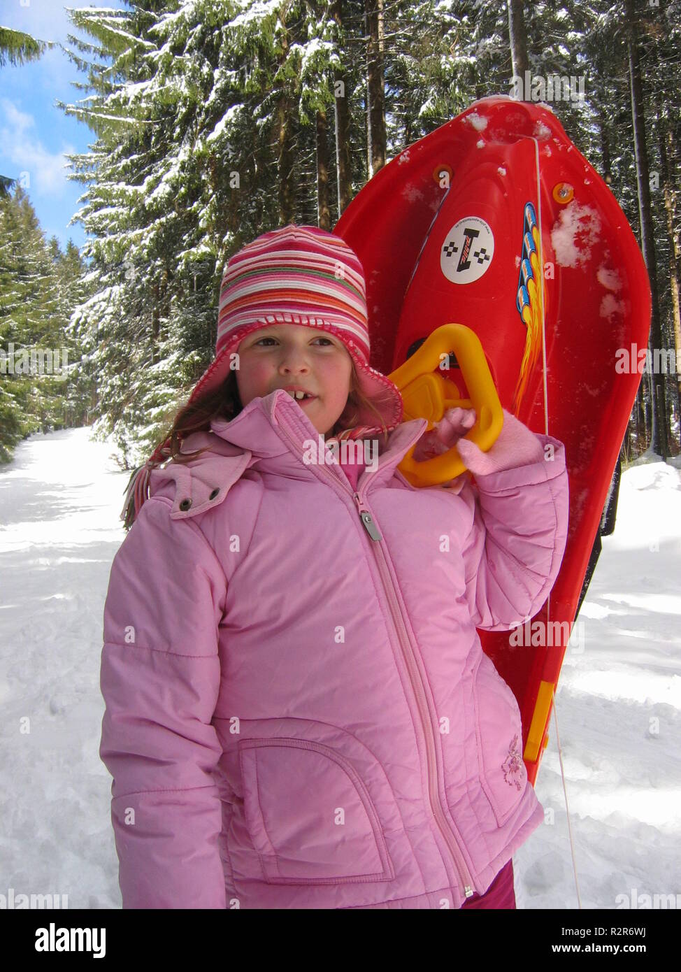 girl with sledge Stock Photo - Alamy