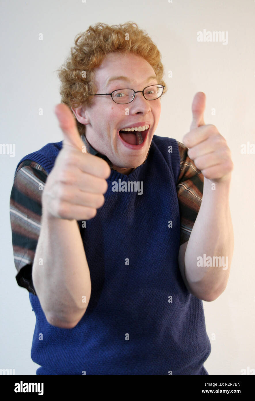 energetic idiot with thumbs up Stock Photo - Alamy