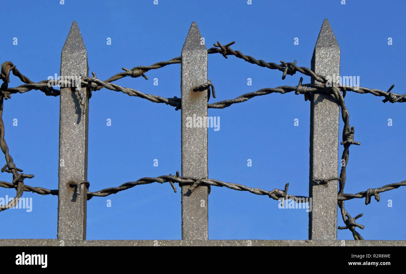 Barbed wire symbolism hi-res stock photography and images - Alamy