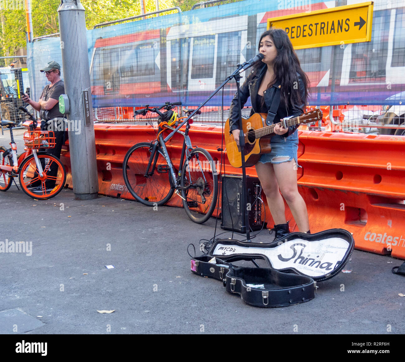 A female busker playing an acoustic guitar, Sydney NSW Australia Stock ...