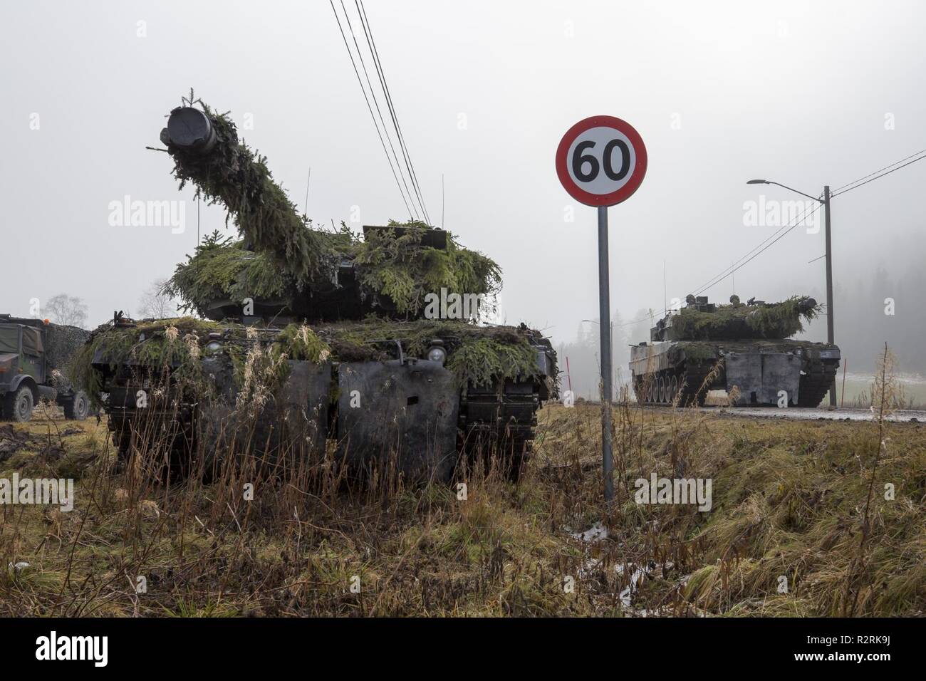 German main battle tank Leopard 2 securing the assembly area of the ...
