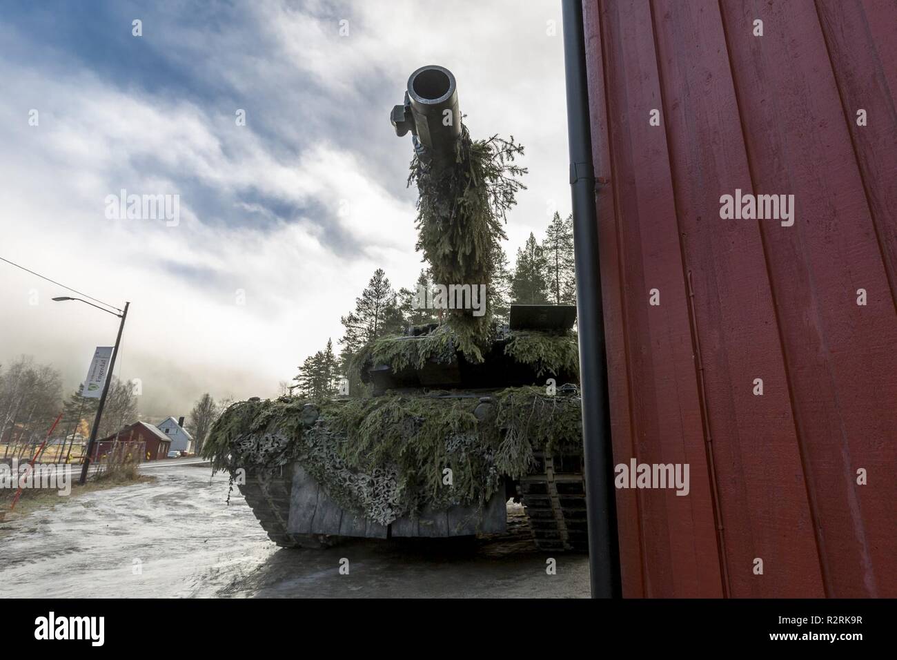 German main battle tank Leopard 2 securing the assembly area of the ...
