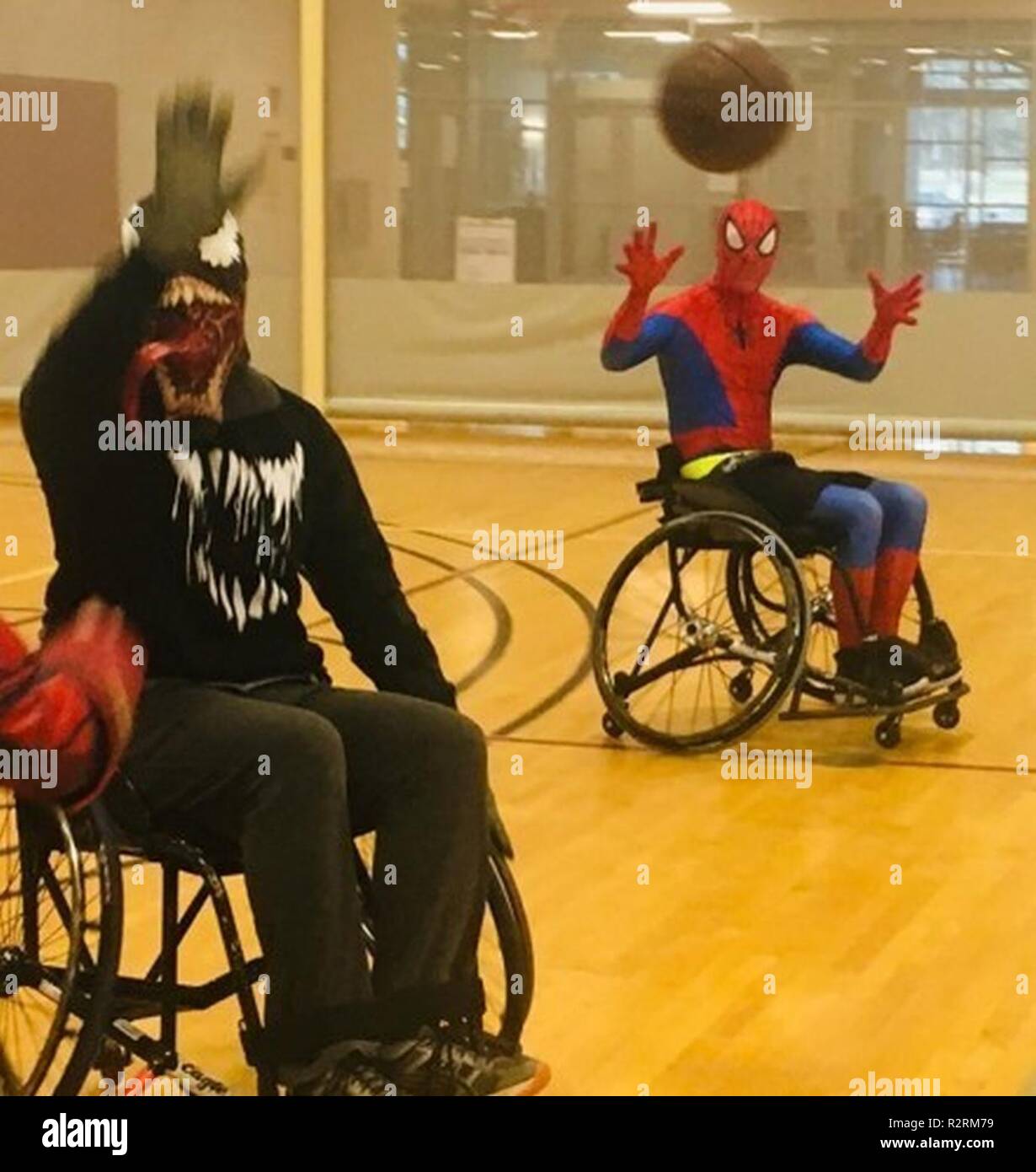 Soldiers dressed as Spiderman and Venom participate in the superhero ...