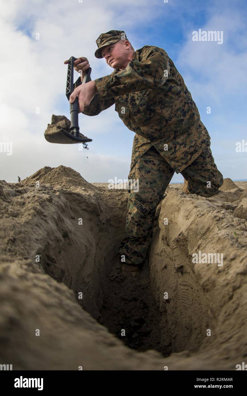 U.S. Navy Petty Officer First Class Russell Groves, a preventive ...