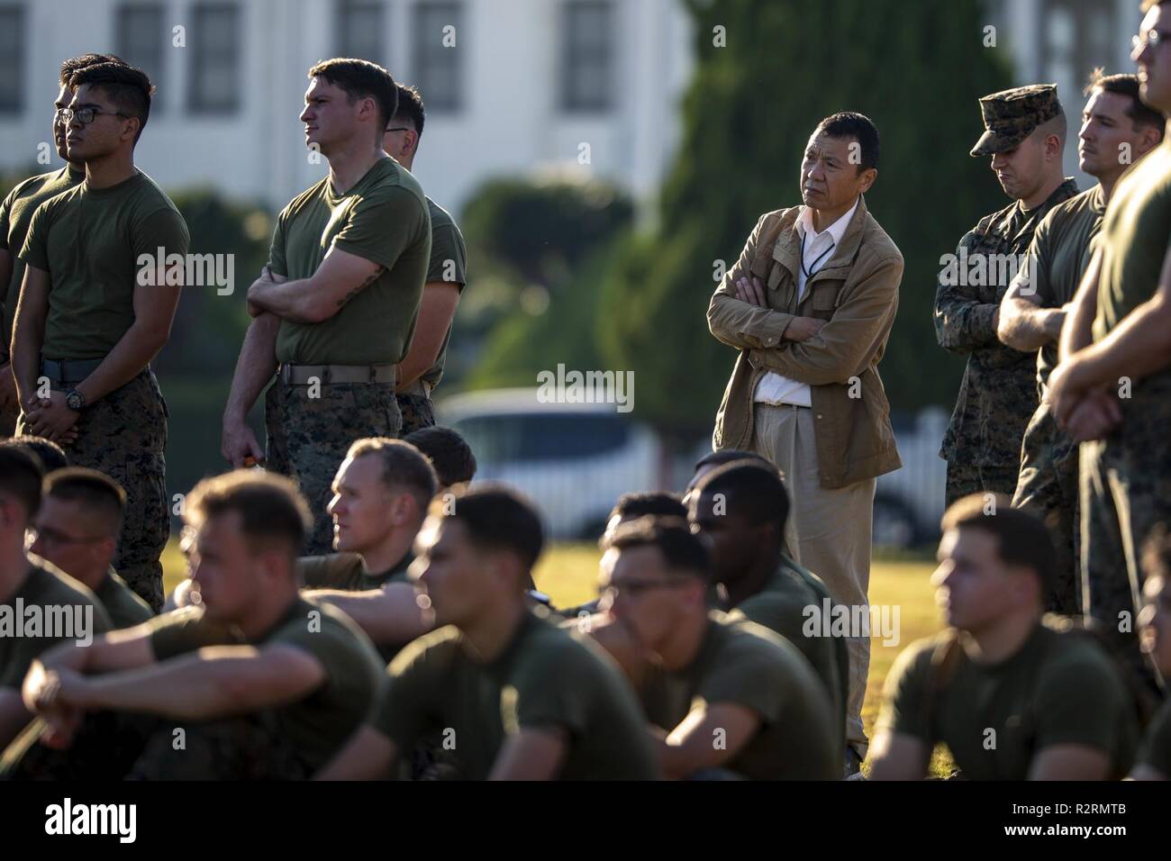 U.S. Marines, Sailors and civilians take part in the 243rd Marine Corps ...