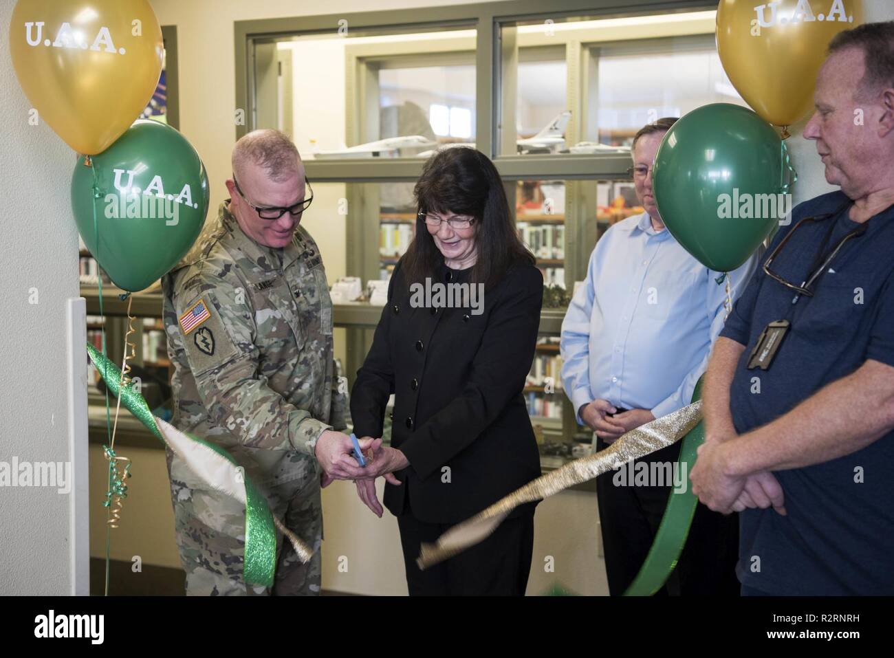 U.S. Army Col. Adam Lange, 673d Air Base Wing vice commander, and Renee ...