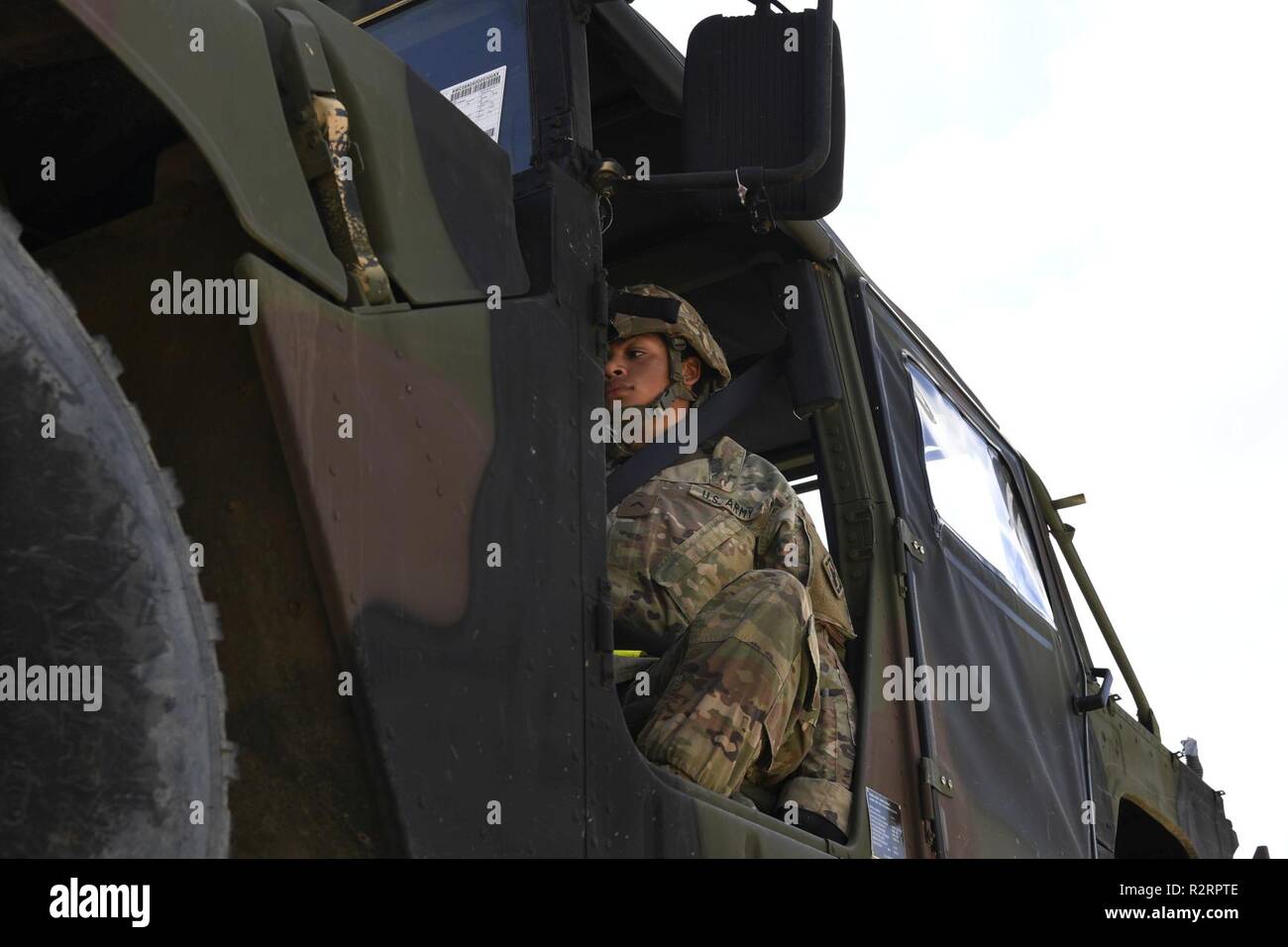 A Soldier drives a military vehicle off of a trailer Nov. 6, 2018, at ...