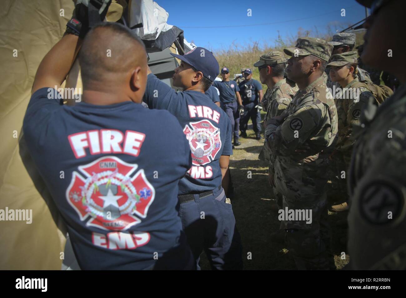 Members of the Saipan Department of Fire and Emergency Medical Services ...