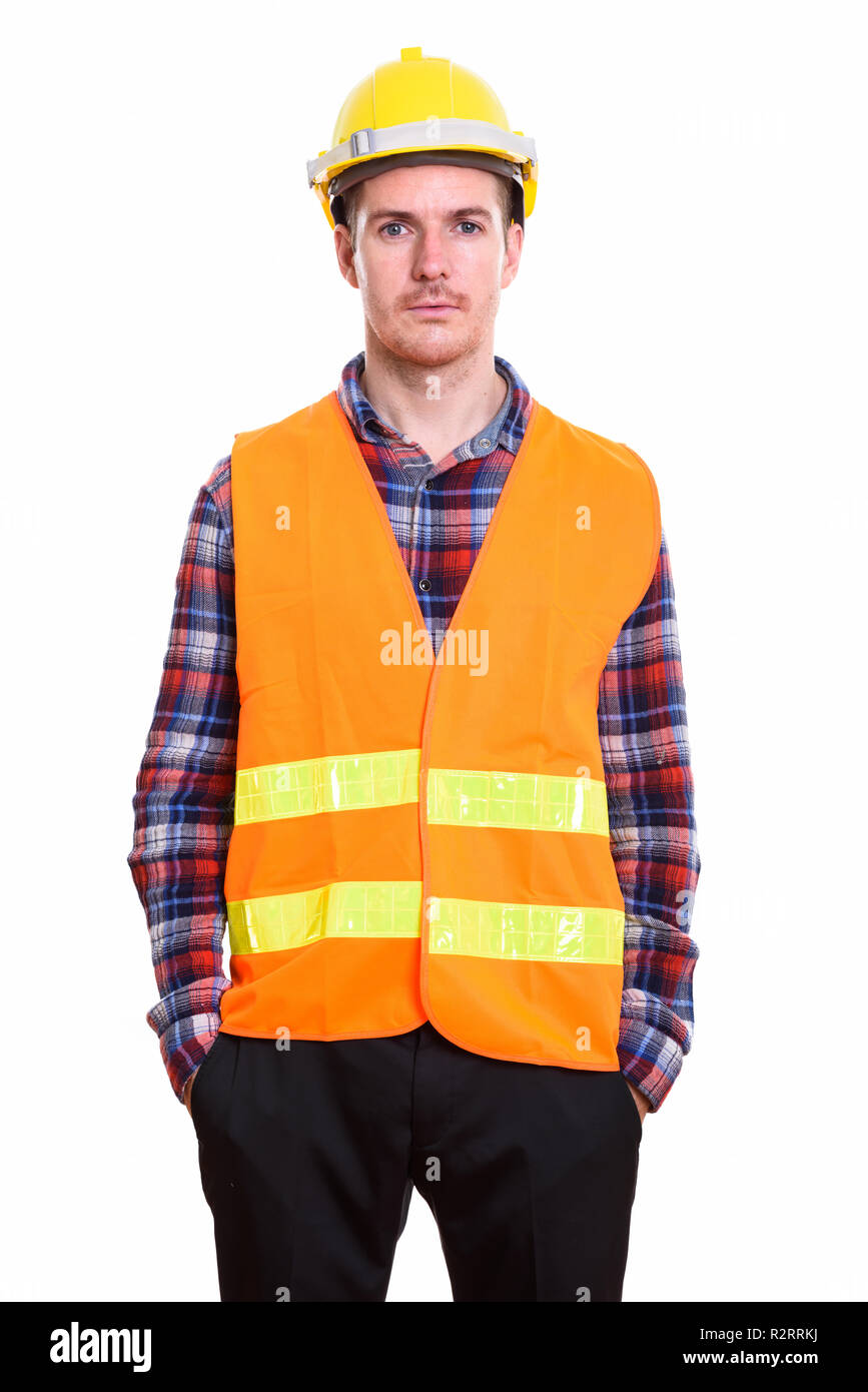Studio shot of man construction worker standing Stock Photo - Alamy