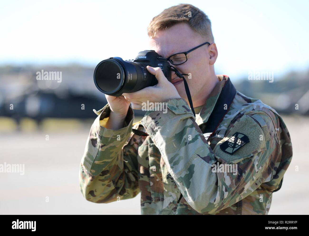 U.S. Army Sgt. Nathan Ploeg, assigned to the 982nd Combat Camera ...
