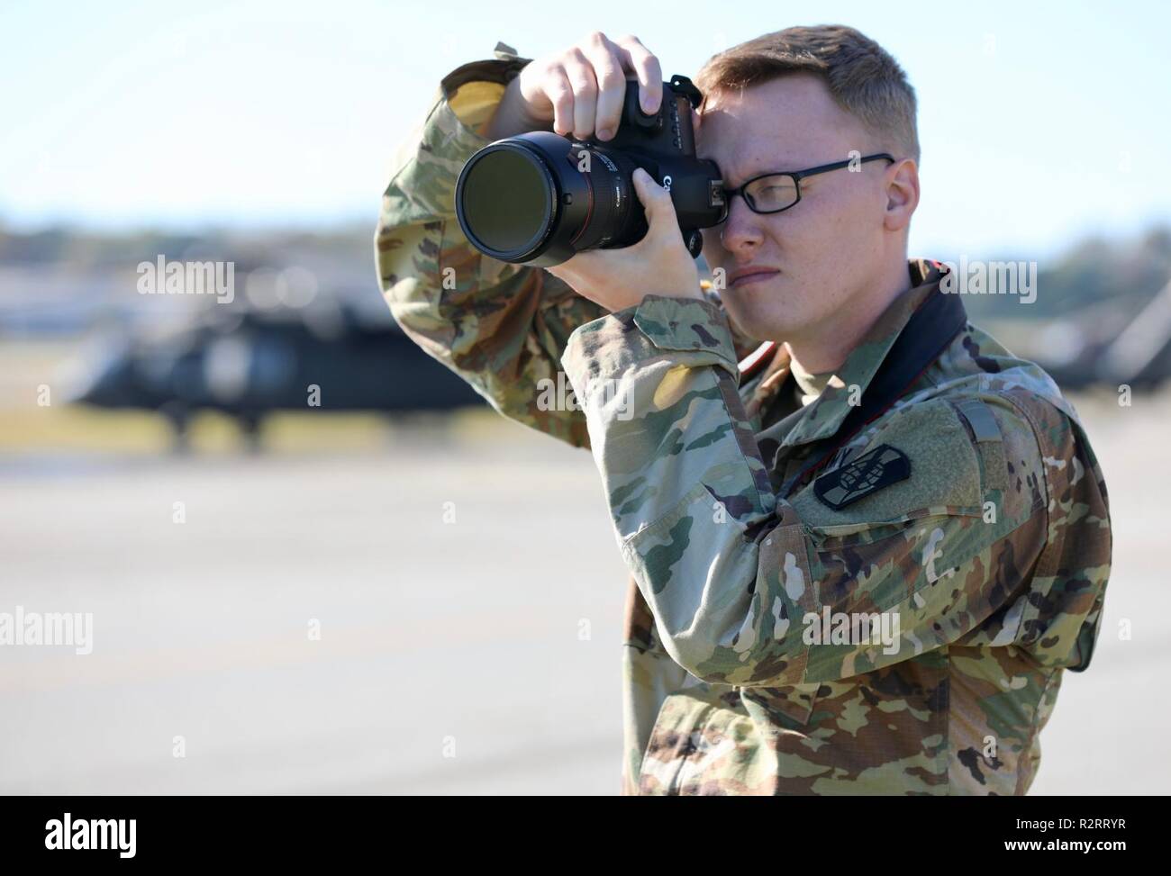 U.S. Army Sgt. Nathan Ploeg, assigned to the 982nd Combat Camera ...