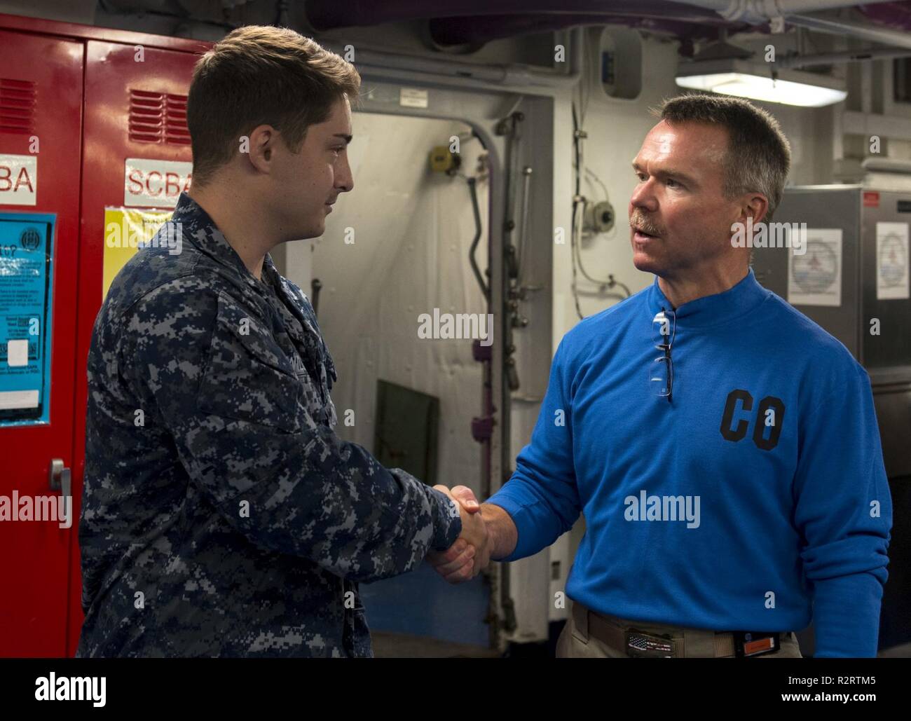 ATLANTIC OCEAN (Nov. 5, 2018) Capt. Sean Bailey, right, commanding ...