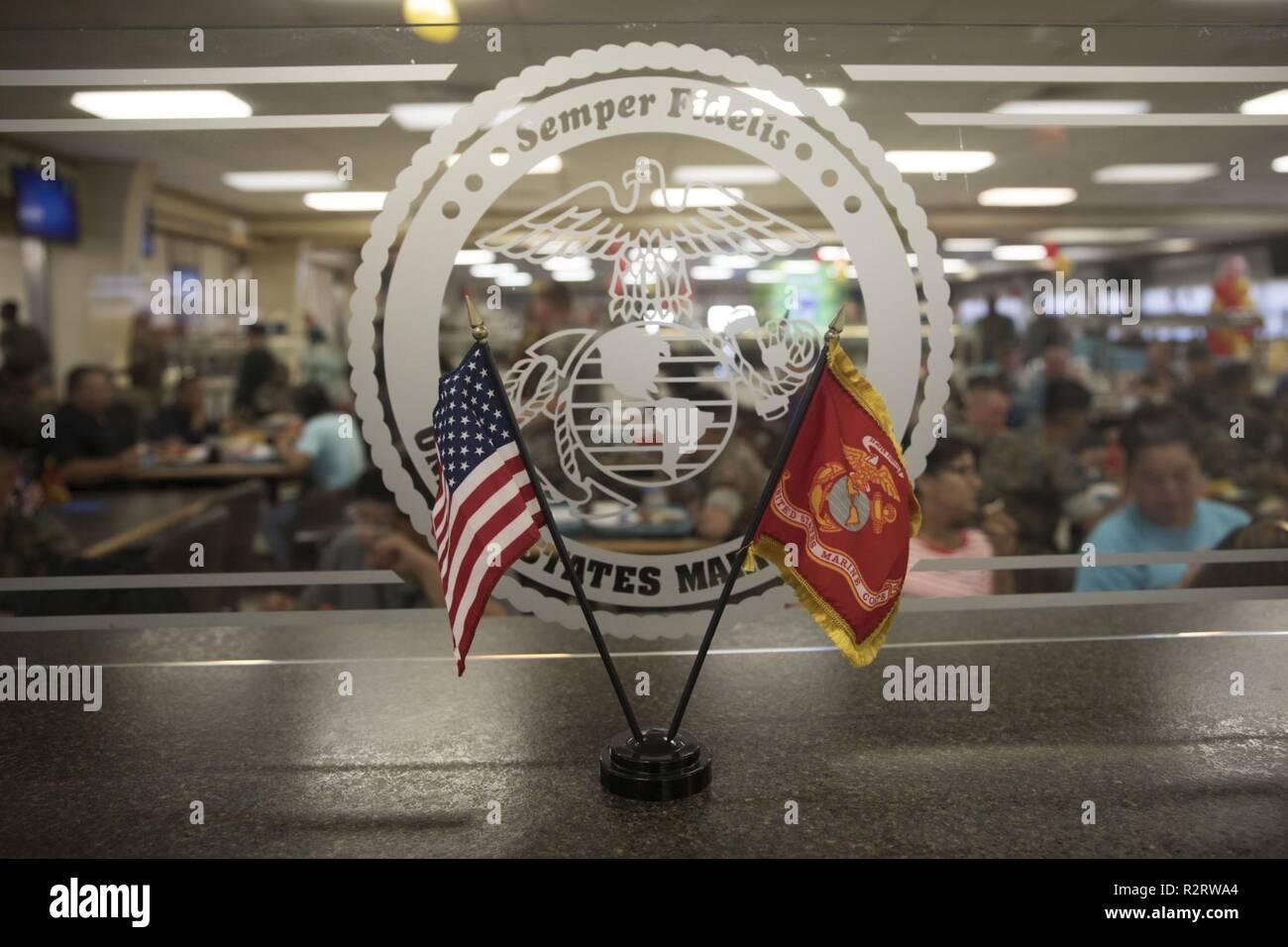 Flags are displayed during a birthday lunch at the Anderson Chow Hall ...