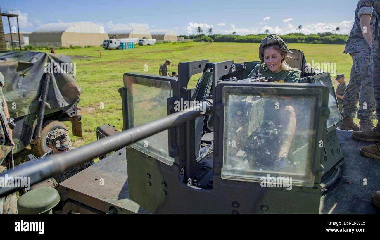 U.S. Marine spouses are given the opportunity to handle weapons during ...