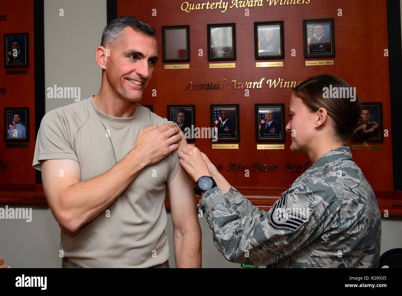Brig. Gen. Daniel Lasica, 31st Fighter Wing commander, receives his flu ...
