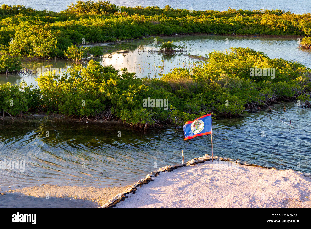 The flag of Belize flies on a makeshift flag pole near San Pedro ...