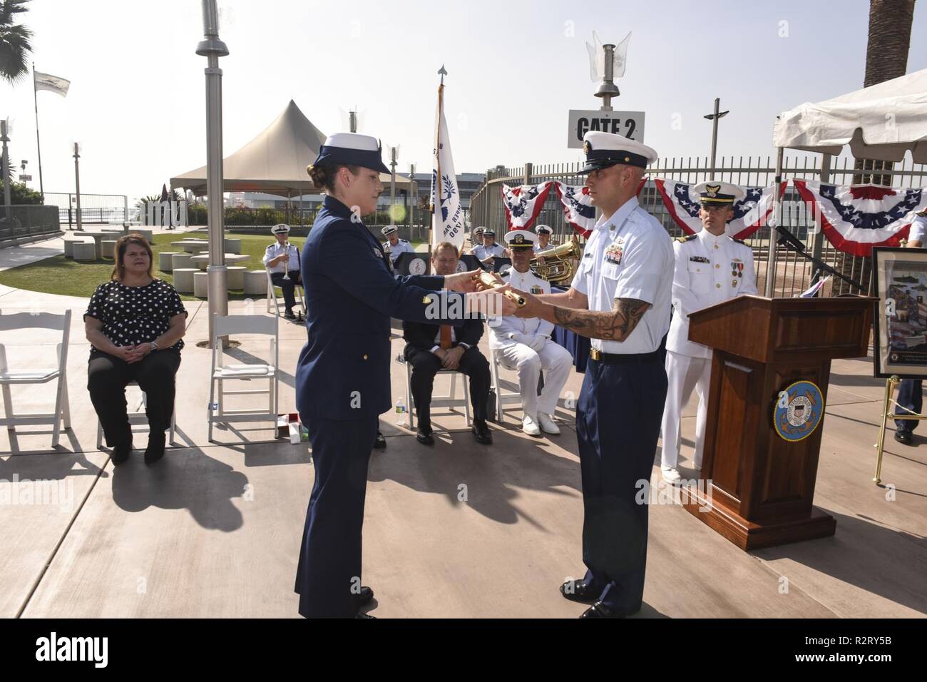 Chief Petty Officer Elizabeth Meister presents Petty Officer 1st Class ...