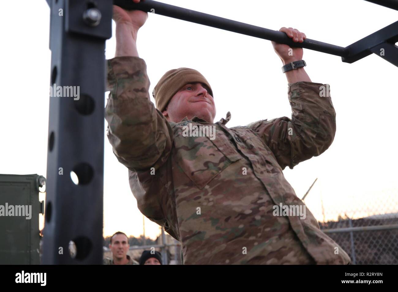 A U.S. Army Soldier performs a chin up during day two of the Best Civil ...