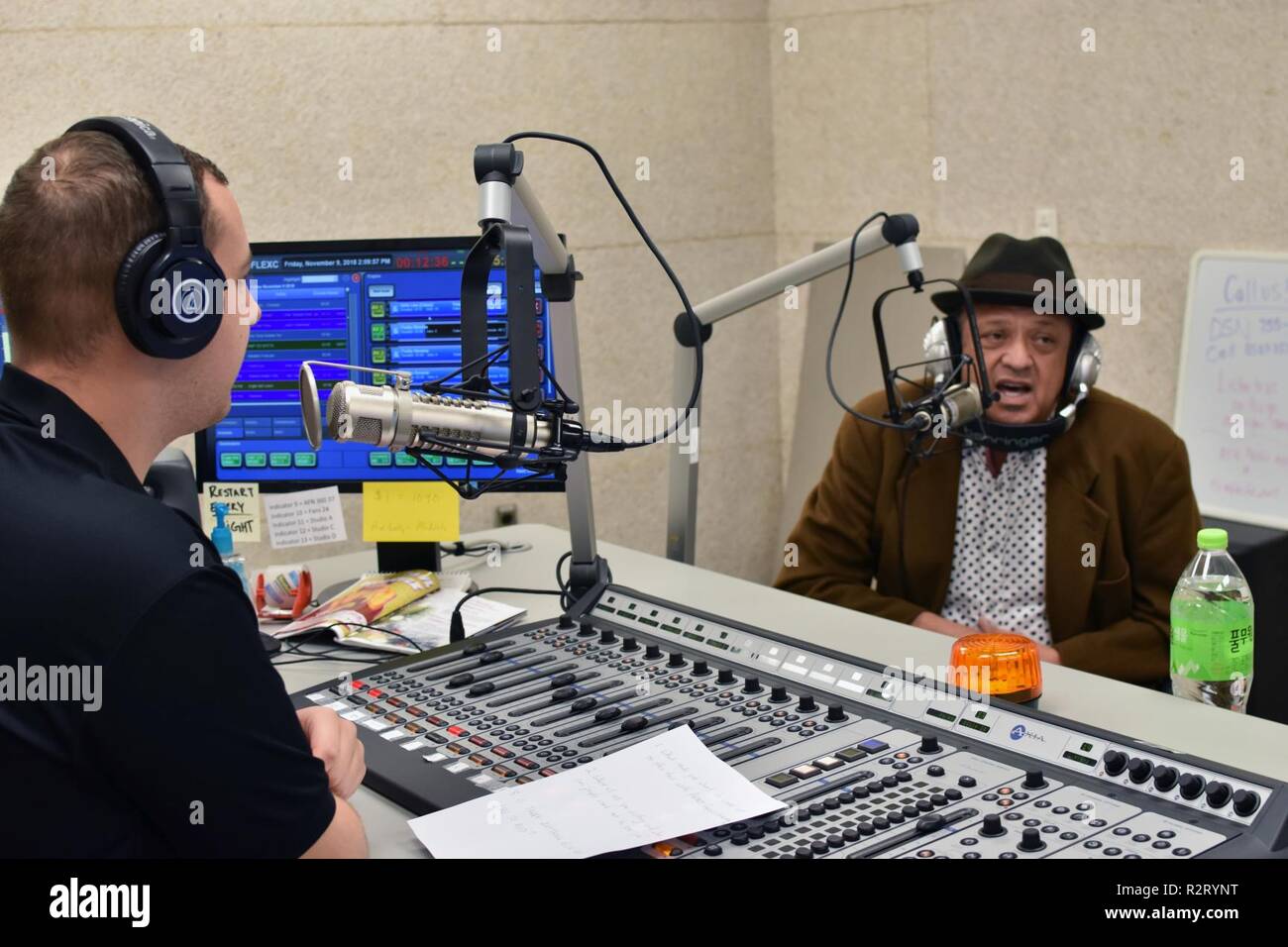 Senior Airman Jonathon Wines (left), disc jockey, asks Paul Rodriguez ...