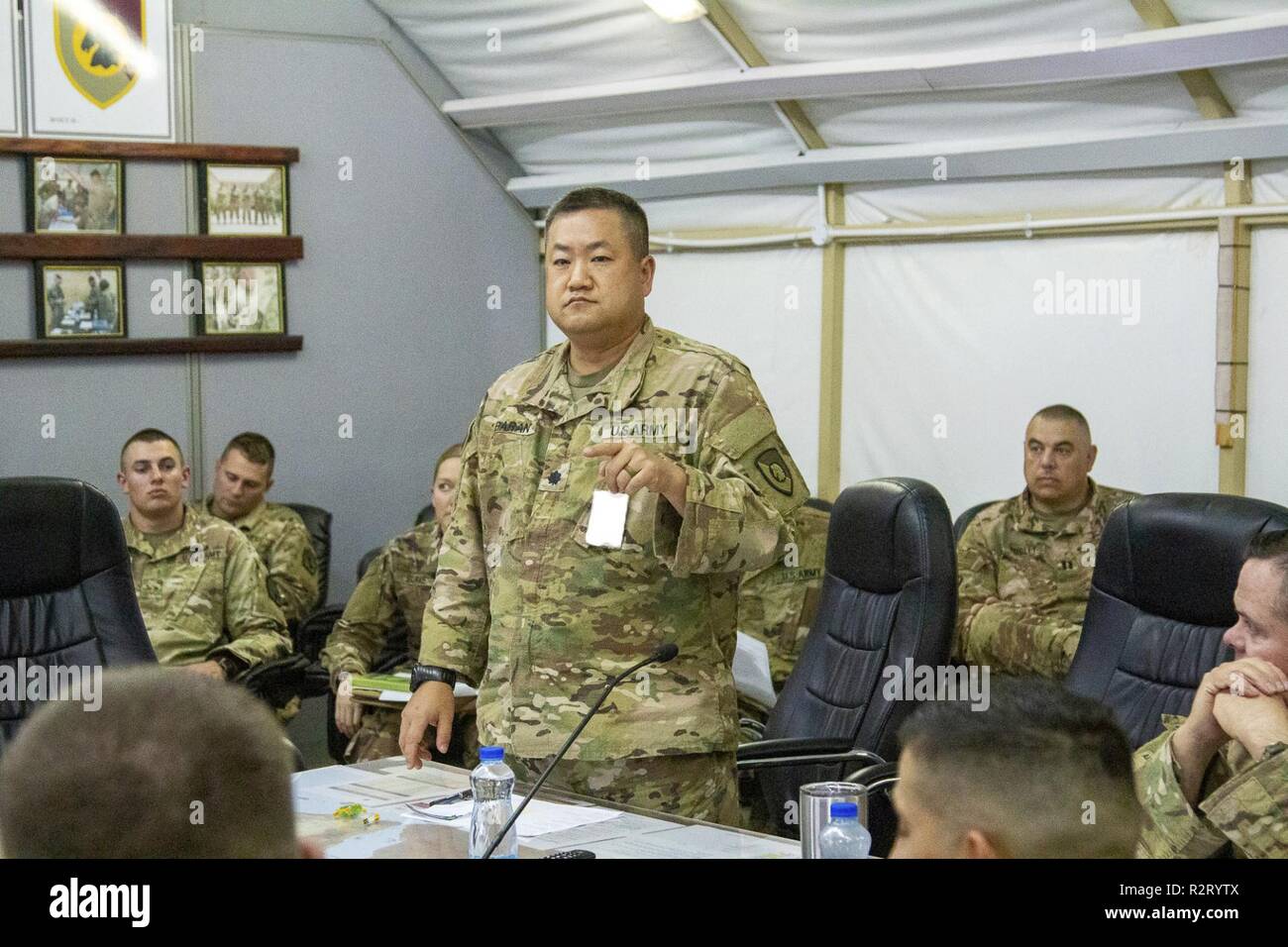 Deputy Commander Lt. Col. Jeremy Baran prepares the officers of the ...