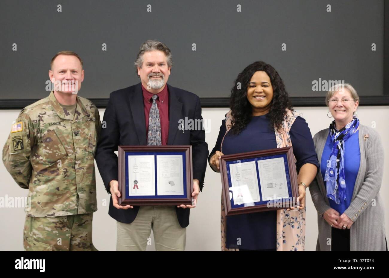 Col. Eric Rannow, AMRDEC military deputy, poses with patent award ...
