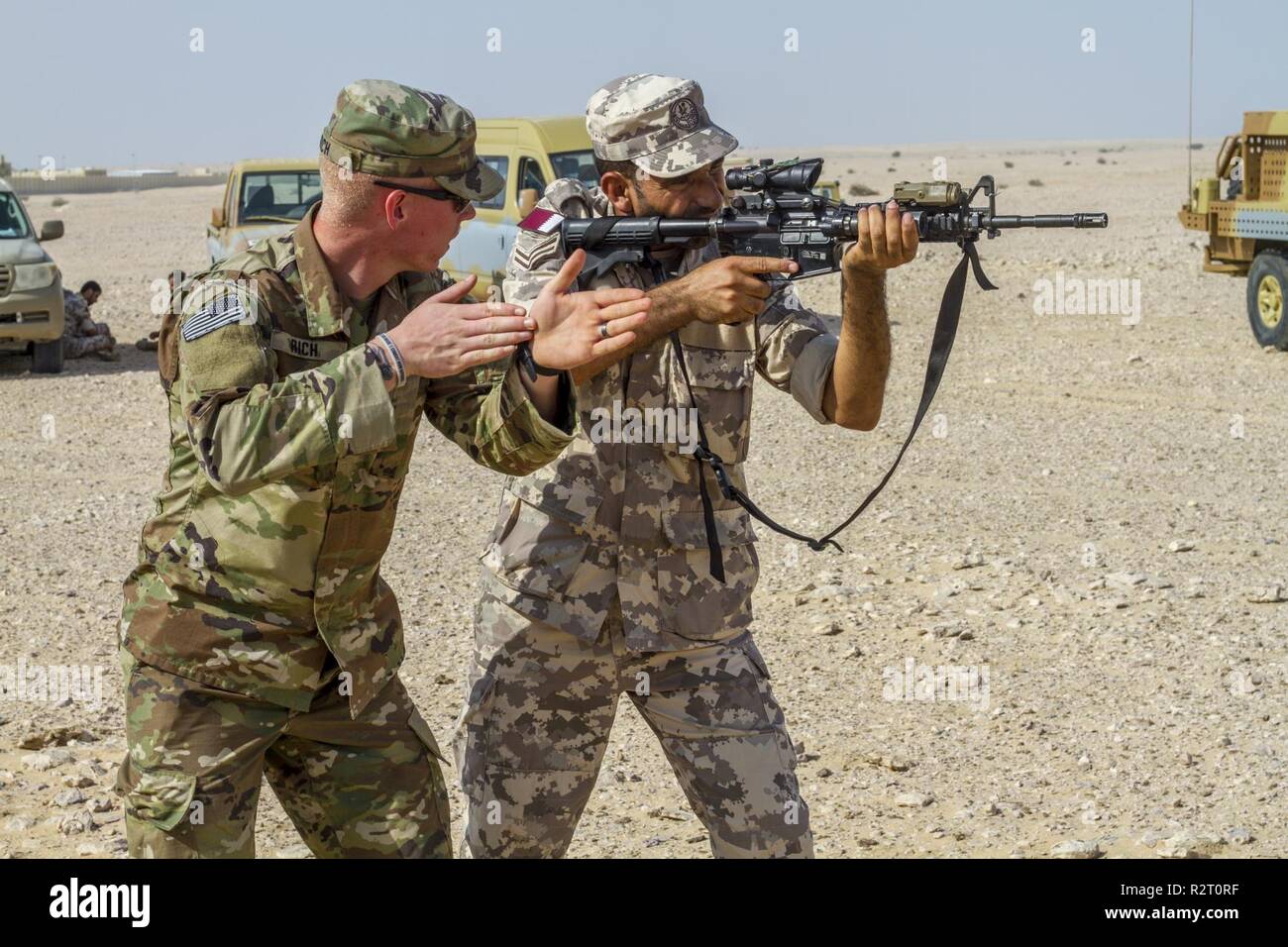 UM HATTAH, Qatar – U.S. Army Spc. Dakota Rich (left), an infantryman ...