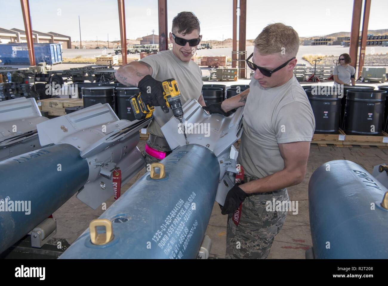 Staff Sgt. Justing Harner and Airman 1st Class Luke Johnson, munitions ...