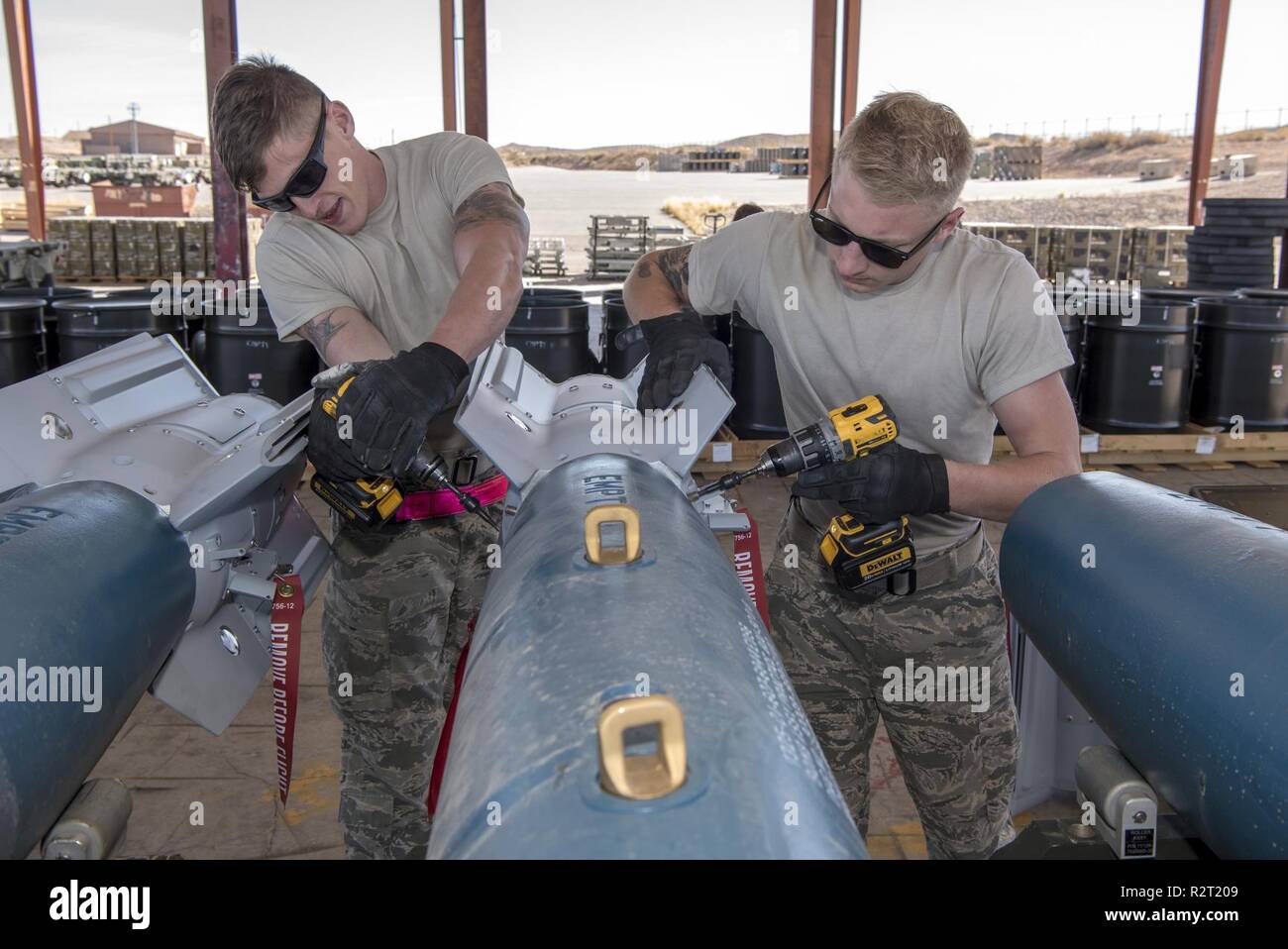 Staff Sgt. Justing Harner and Airman 1st Class Luke Johnson, munitions ...