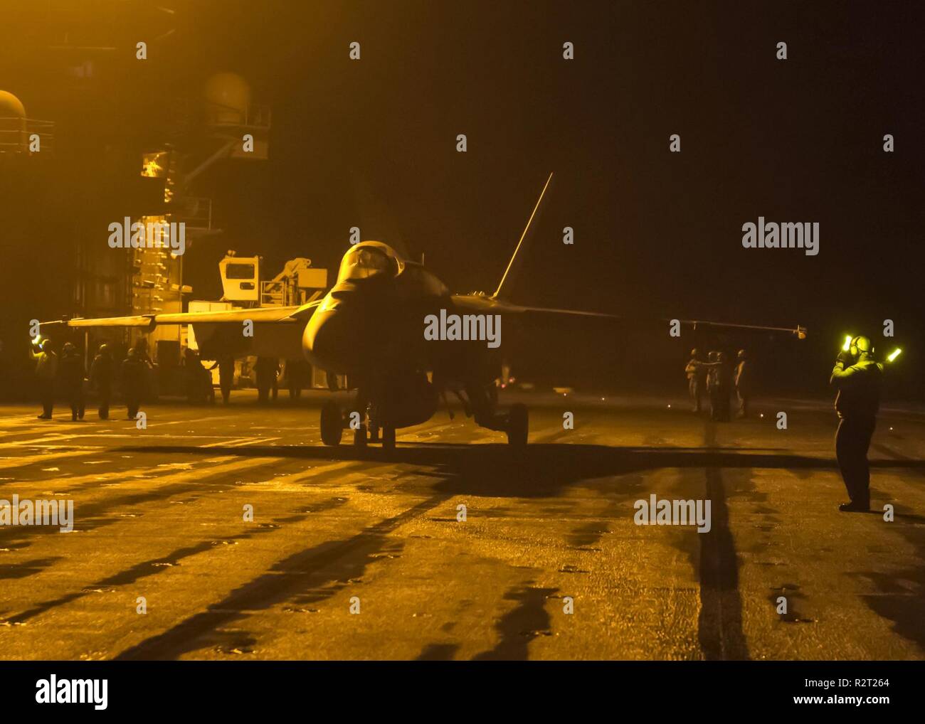 ATLANTIC OCEAN (Nov. 6, 2018) Sailors conduct night flight operations ...