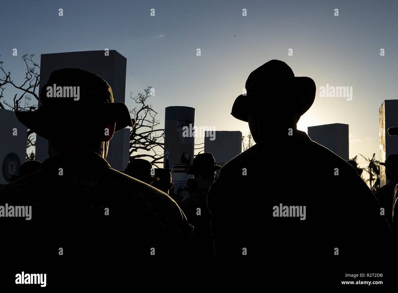 Marines and Sailors with Combat Logistics Battalion 31 stand in ...
