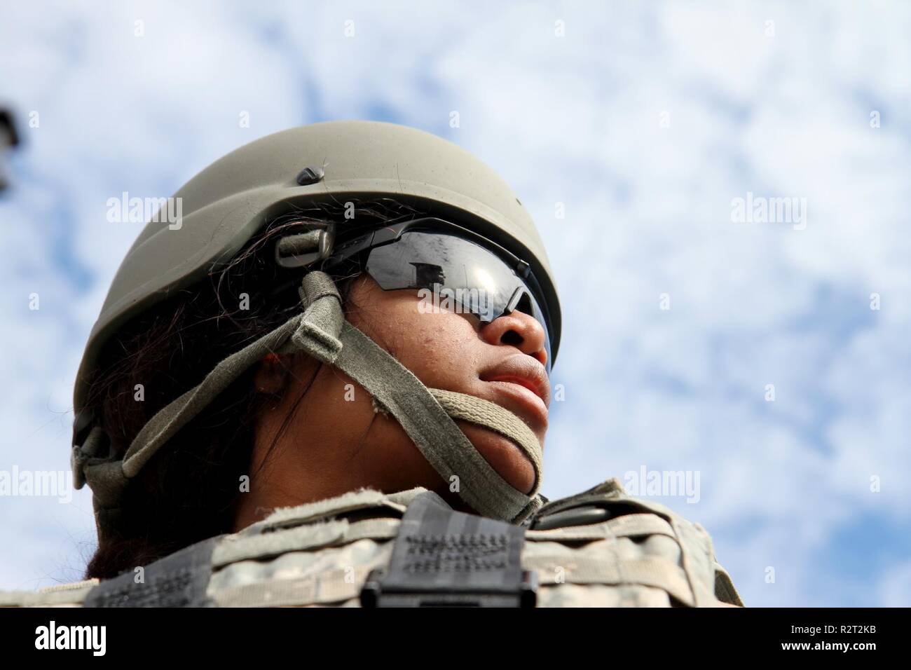 Partly cloudy skies above provide Spc. Savannah McLaughlin from the ...
