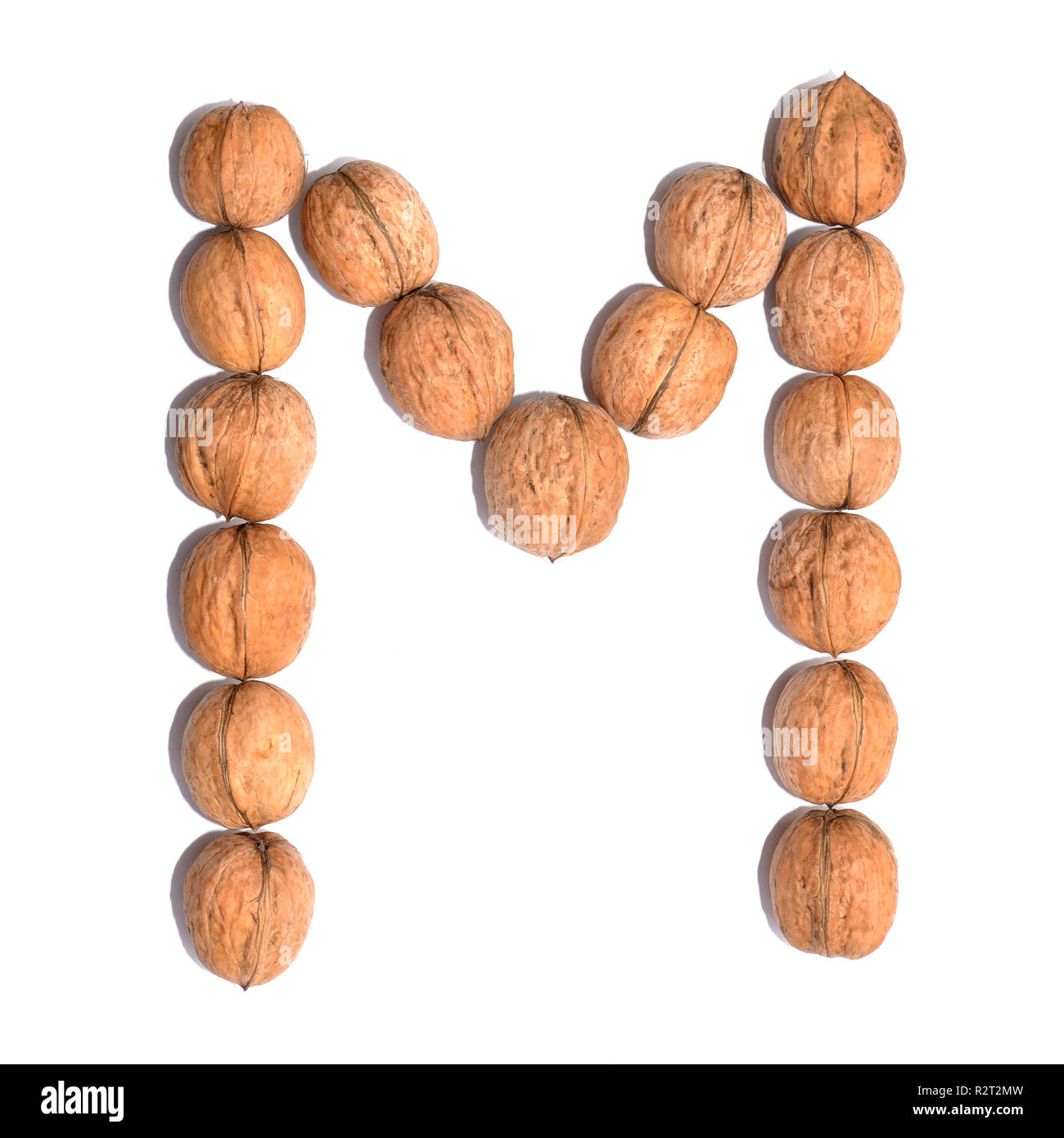 Letter M made with nuts to form a letter of the alphabet. Fruit letters ...