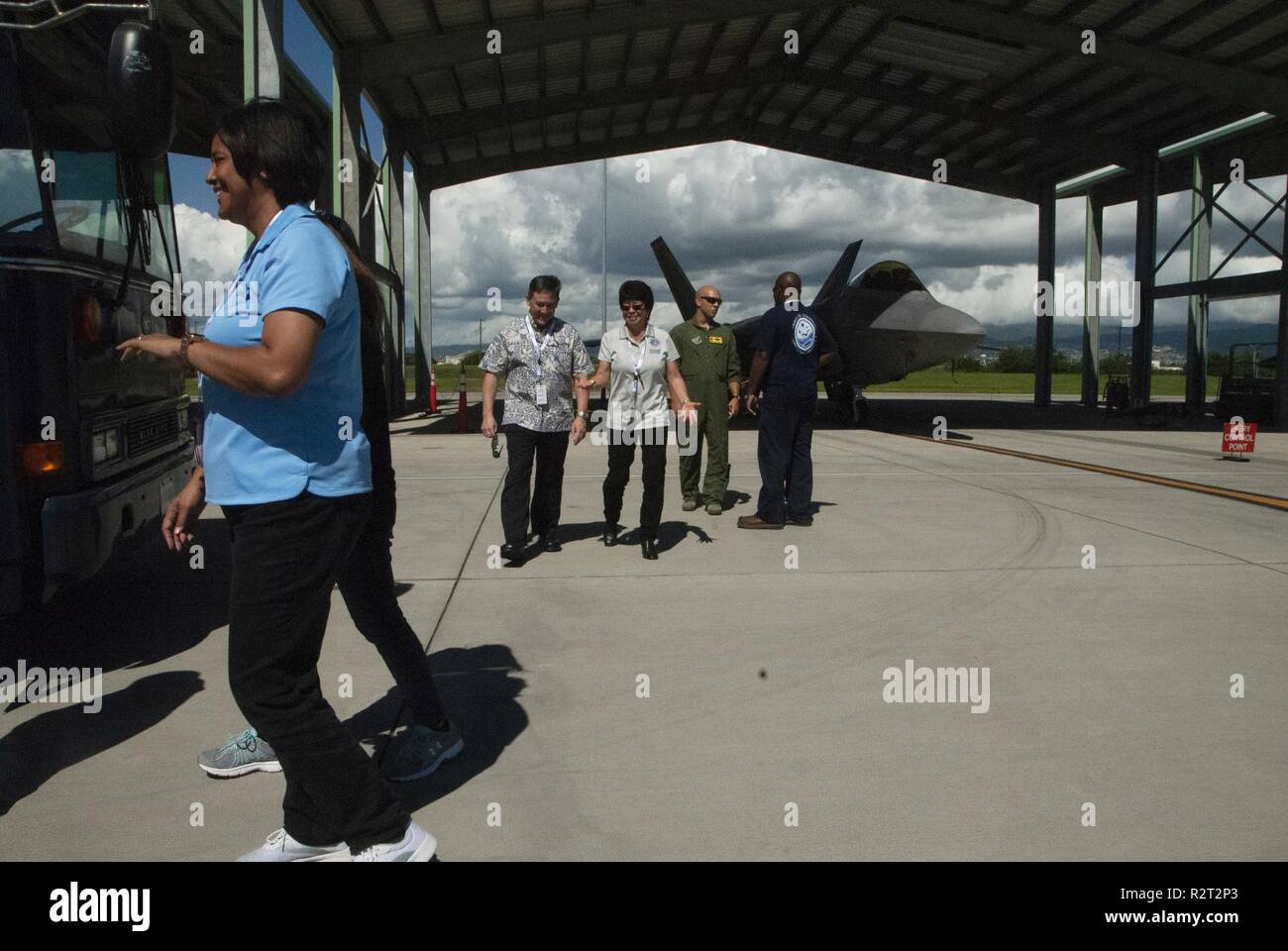 Bosses of Hawaii Air National Guard (HIANG) employees, board a bus on ...