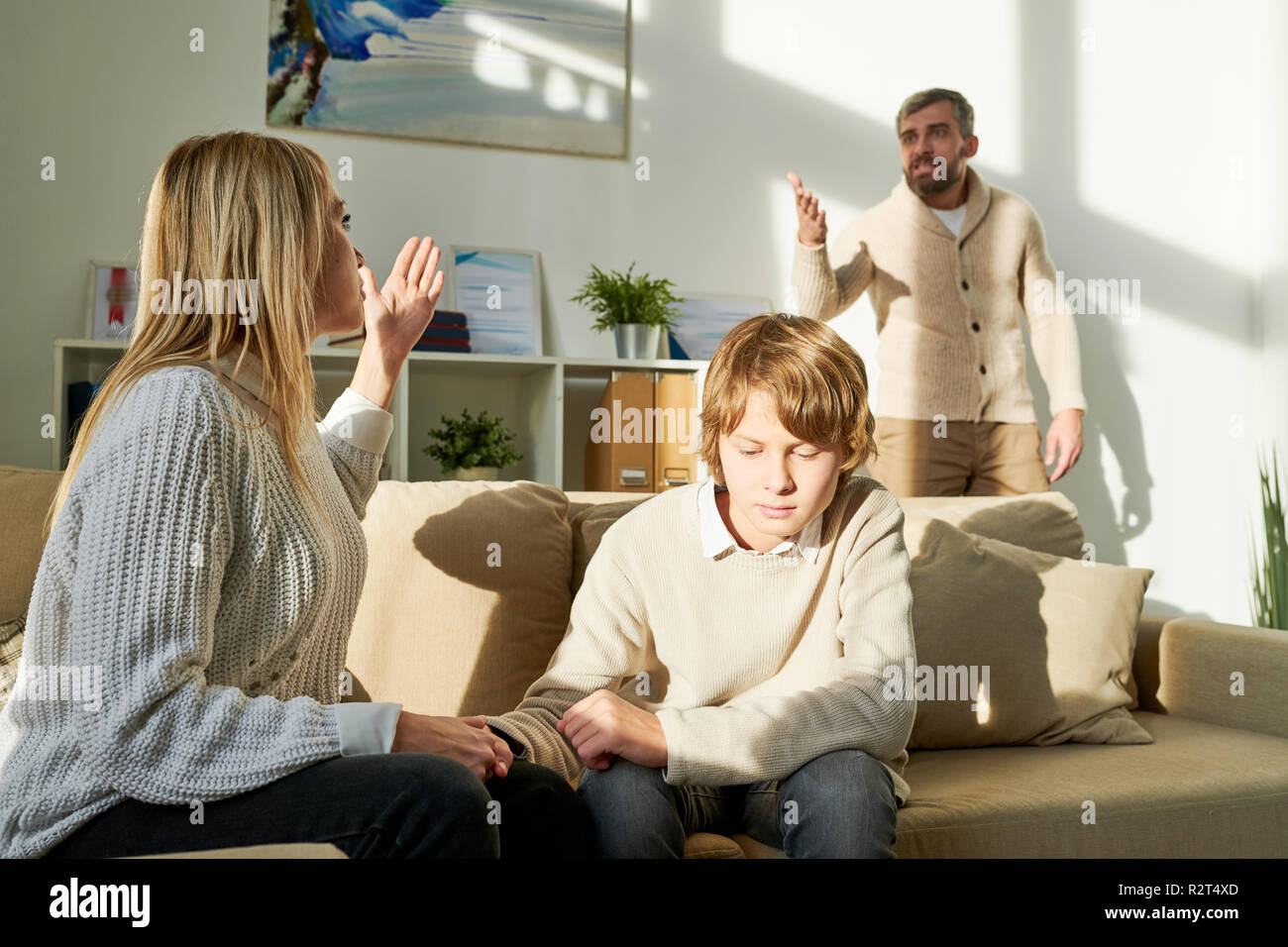 Man protecting woman hi-res stock photography and images - Alamy