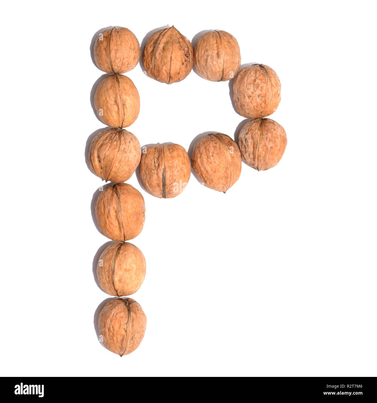 Letter P made with nuts to form a letter of the alphabet. Fruit letters ...