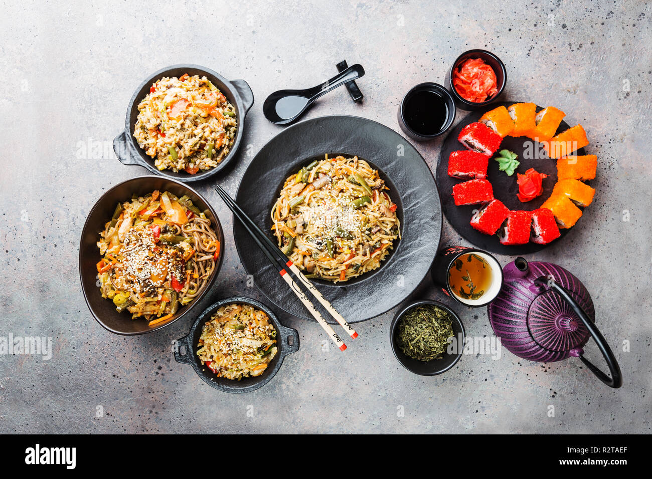 Asian food set served on gray stone background, top view. Chinese ...