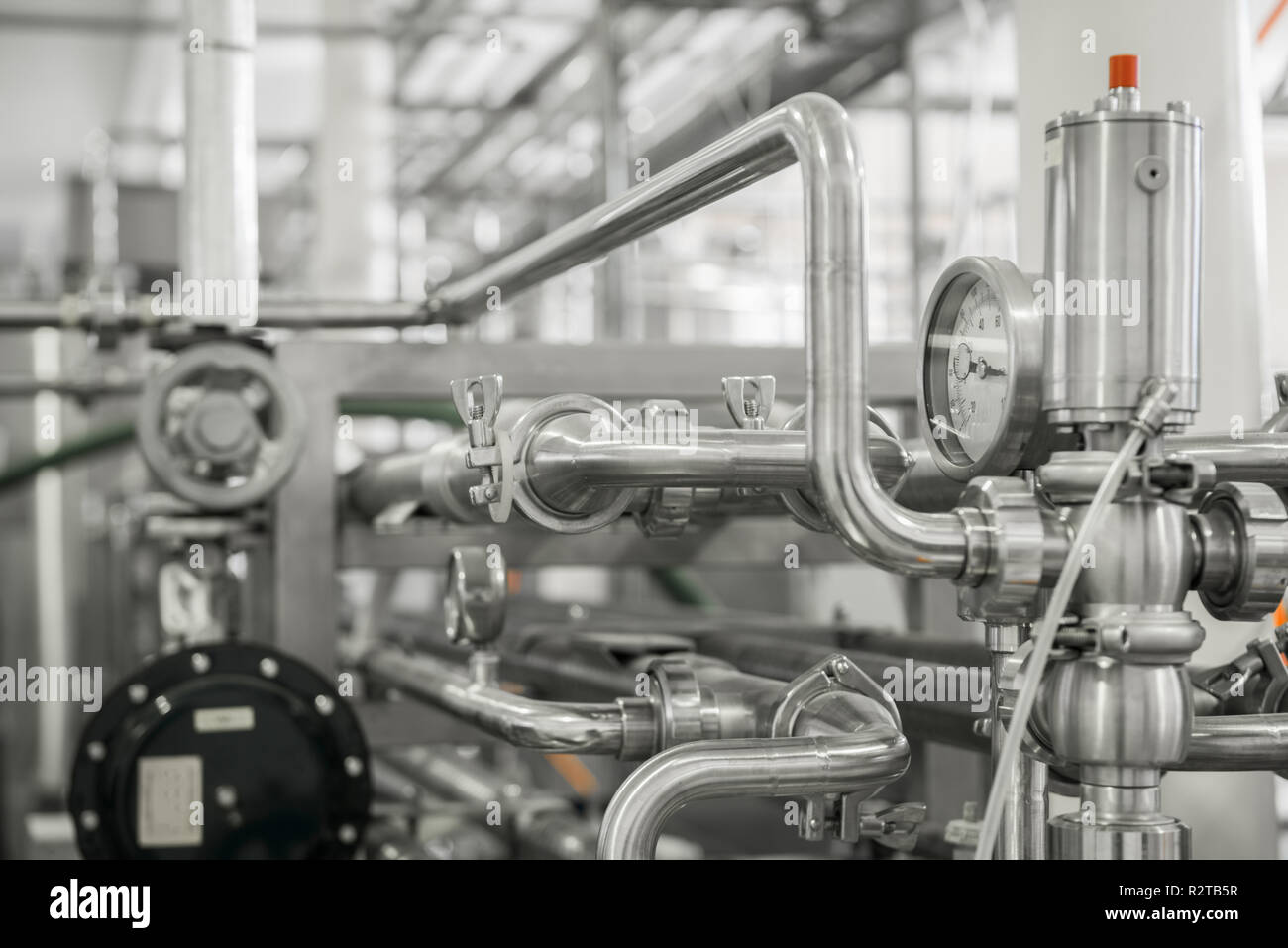 measurement sensors and pipes in the factory. equipment at the dairy ...
