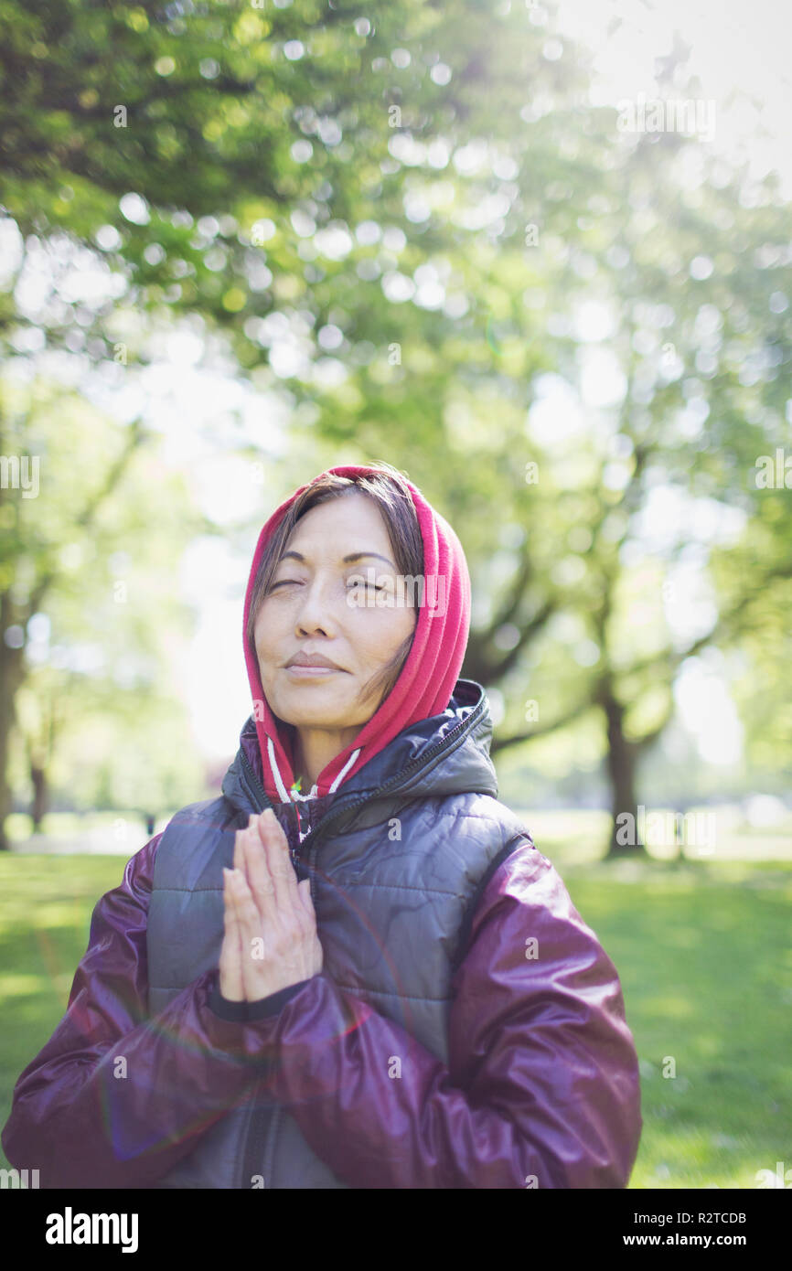 Senior standing meditating hi-res stock photography and images - Alamy