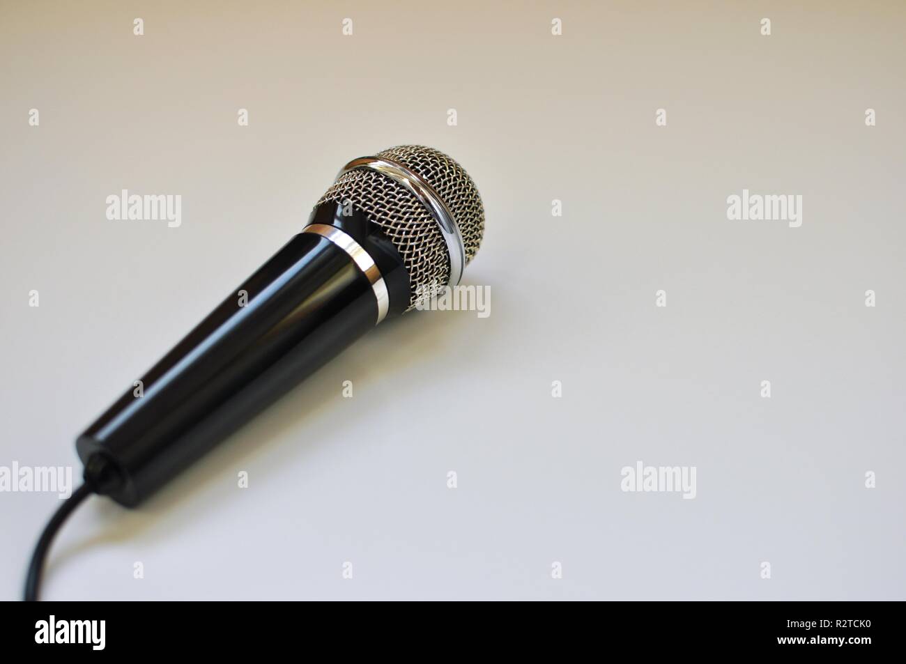 Black microphone view from top side, isolated on white background with ...