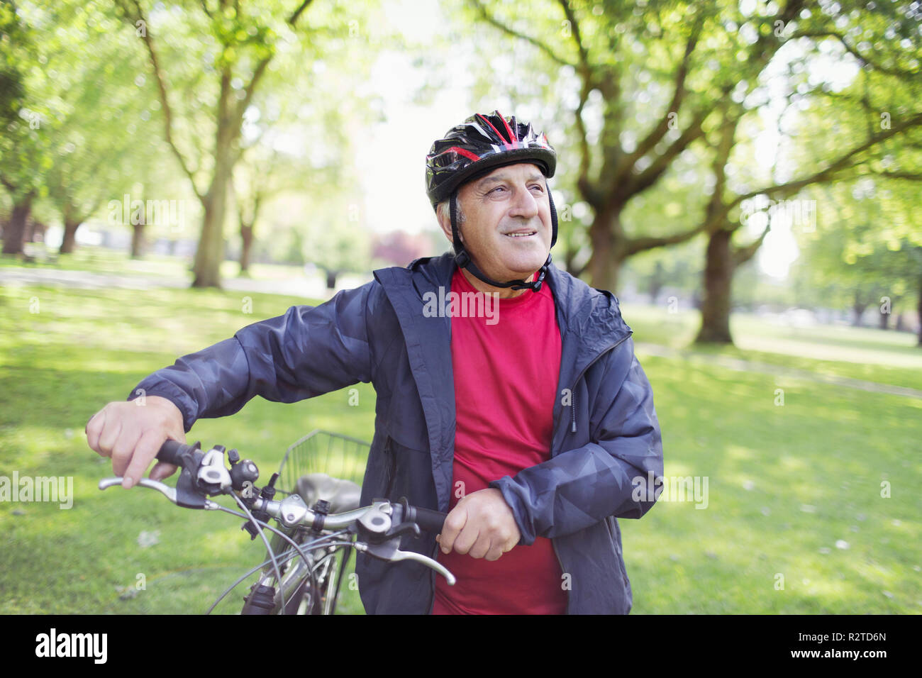 Adult man riding a bicycle hi-res stock photography and images - Alamy