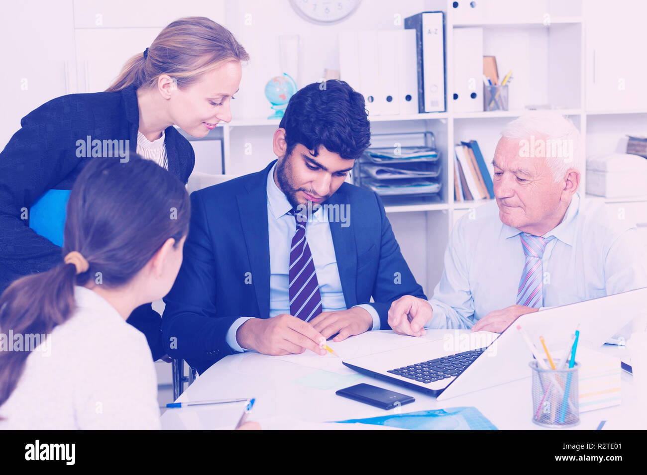 Office workers are writing financial reports in the office Stock Photo ...