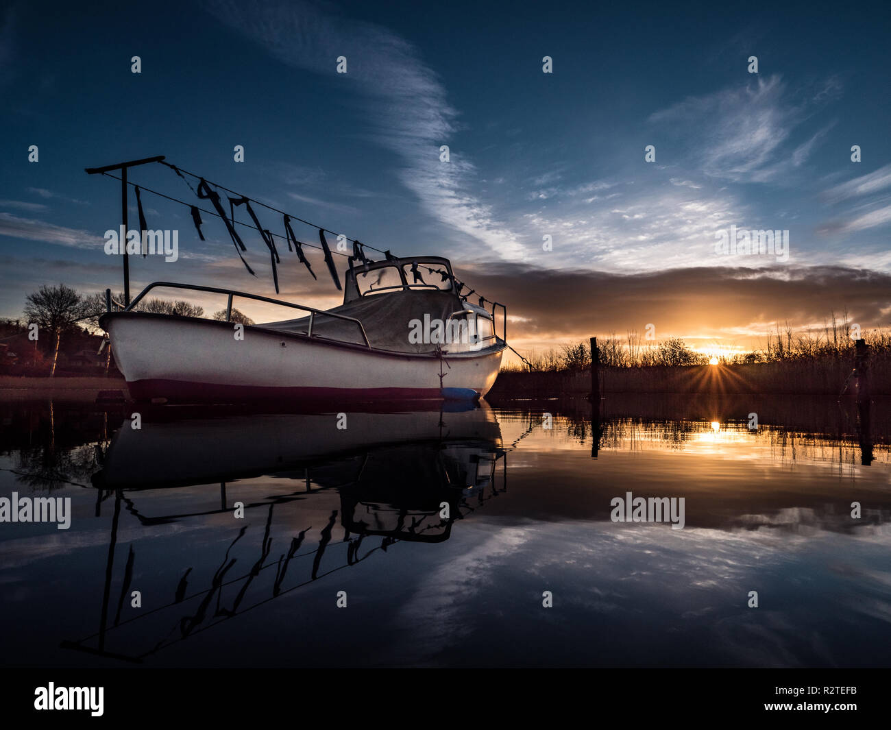 Image of a marina with water reflection and dramatic sky Stock Photo ...