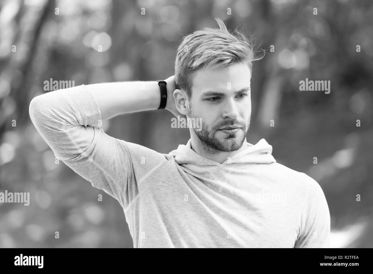 Man confident in his antiperspirant. Guy checks dry armpit satisfied ...