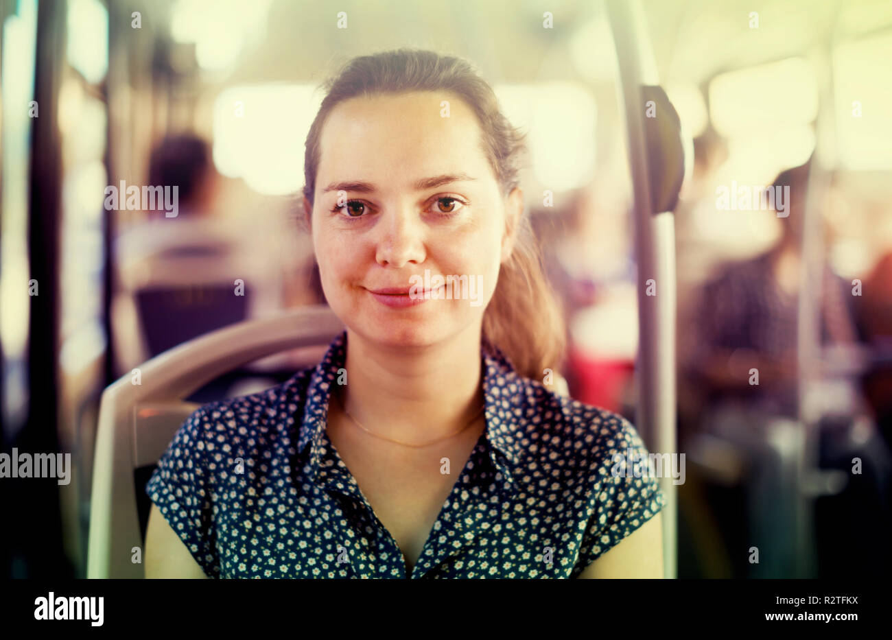 adult female tourist taking bus journey in city Stock Photo - Alamy