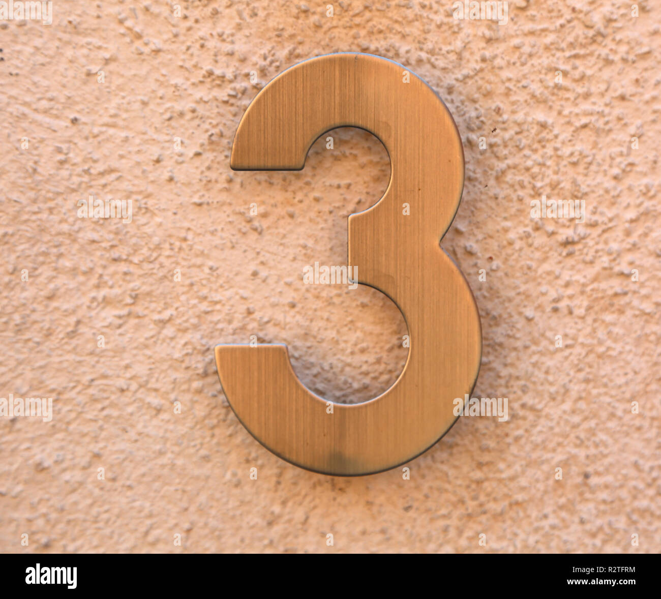 very big text number 3 in golden metal Stock Photo - Alamy