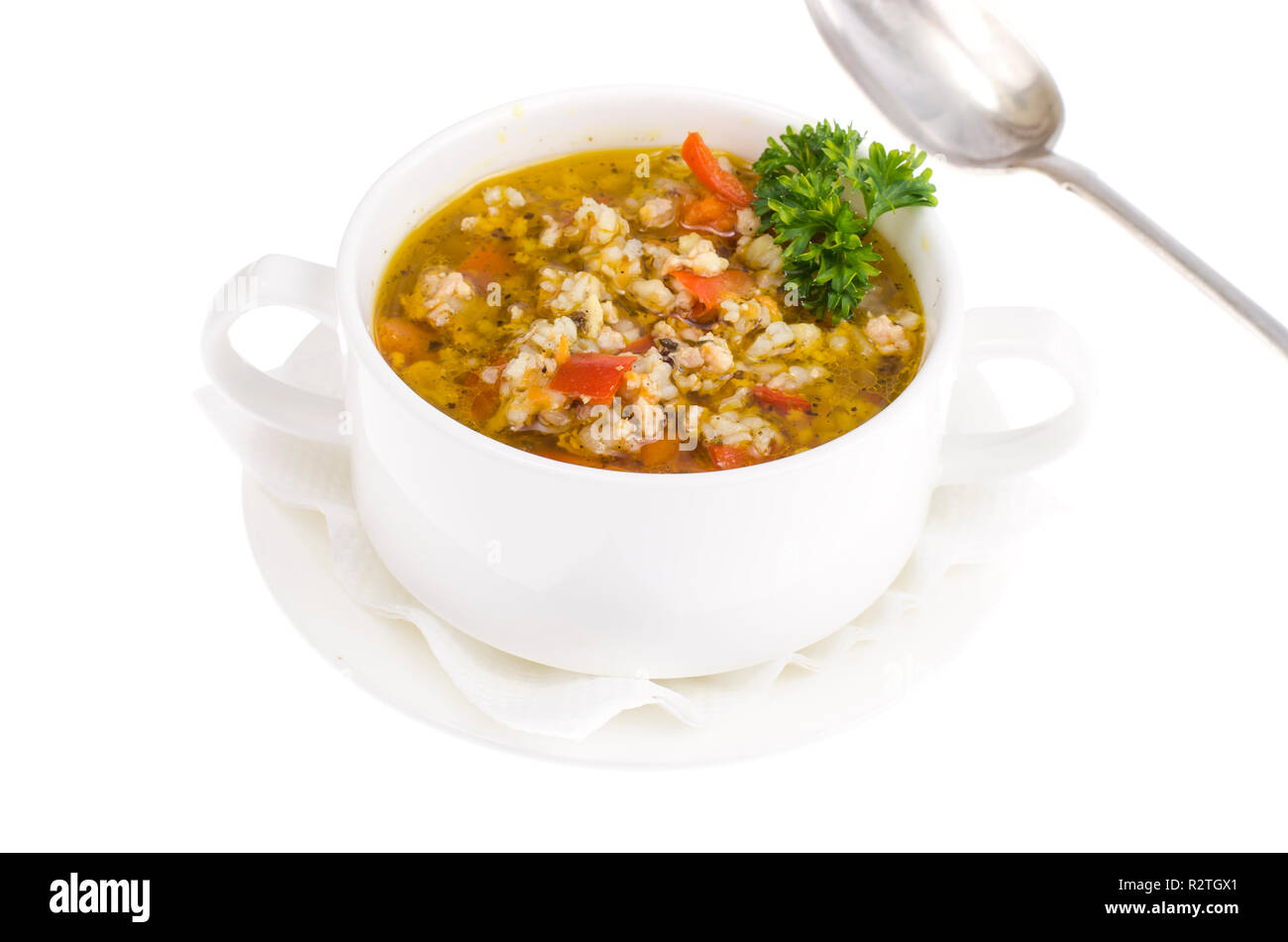 Bowl with rice soup and vegetables isolated on white background. Studio ...